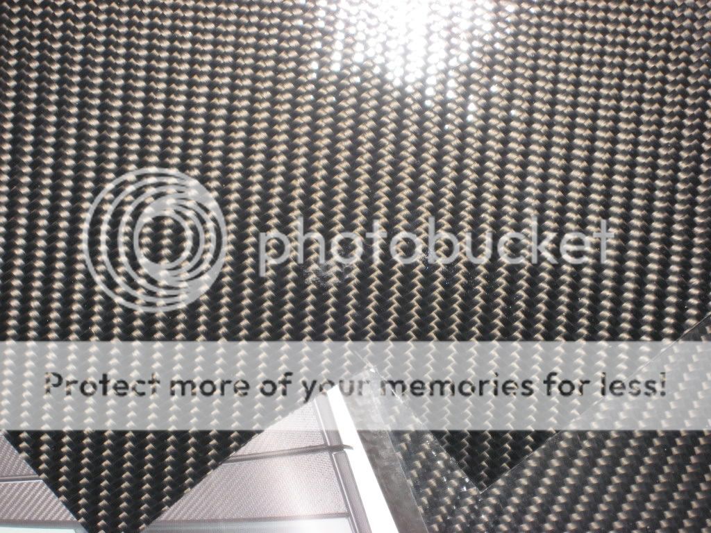 REAL Carbon Fiber and Silver Texalium ... maybe decals or what?